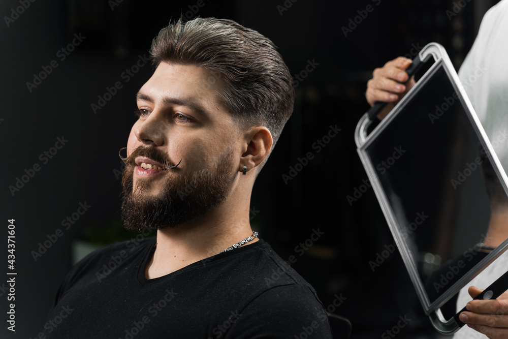 Barber with dreadlocks showing result of low fade machine hair and ...