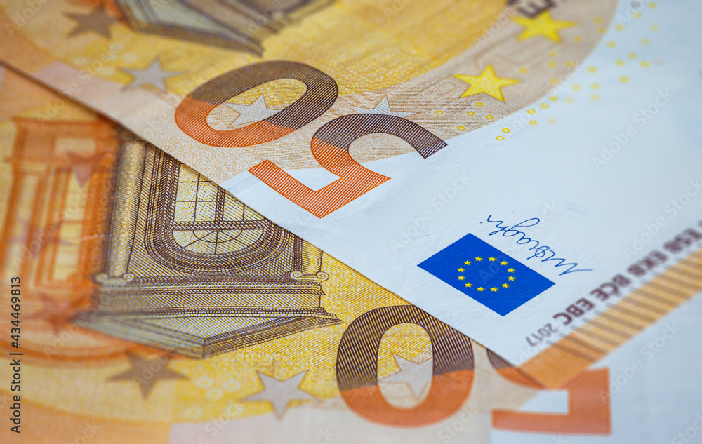 Close up on 50 Euro banknote with the European flag. Euro, currency of ...