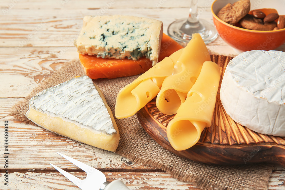 Different types of cheese on light background, closeup Stock Photo ...