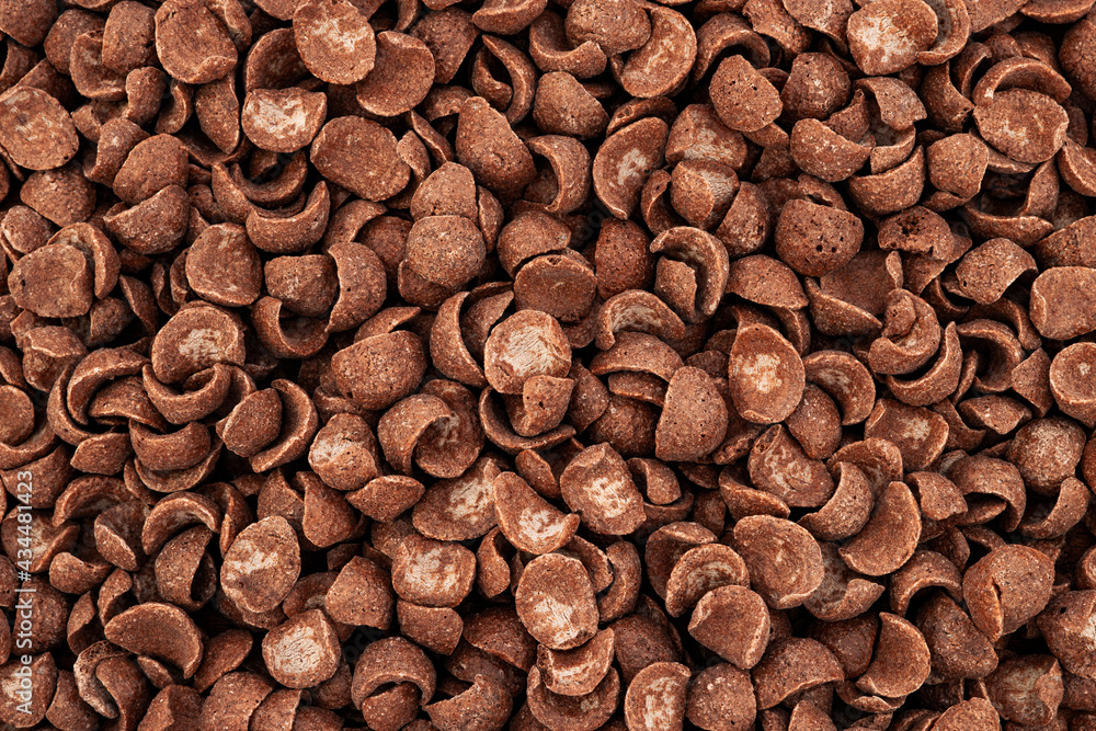 Chocolate cereal flakes background. Crispy chocolate crunch corn flakes ...