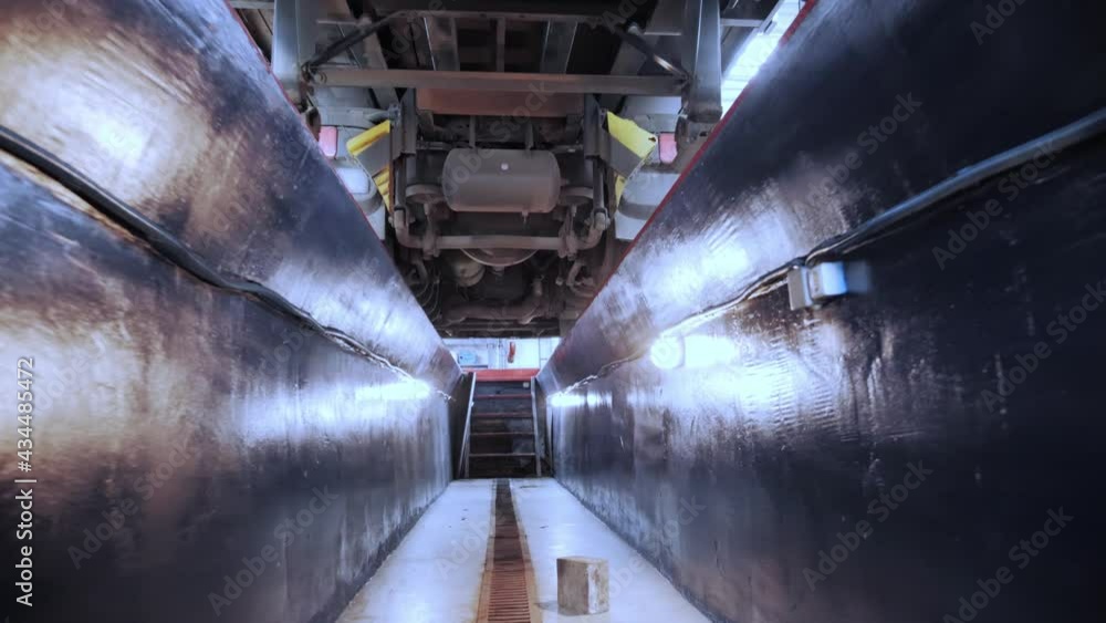 Bottom view of the truck from the service station inspection pit ...