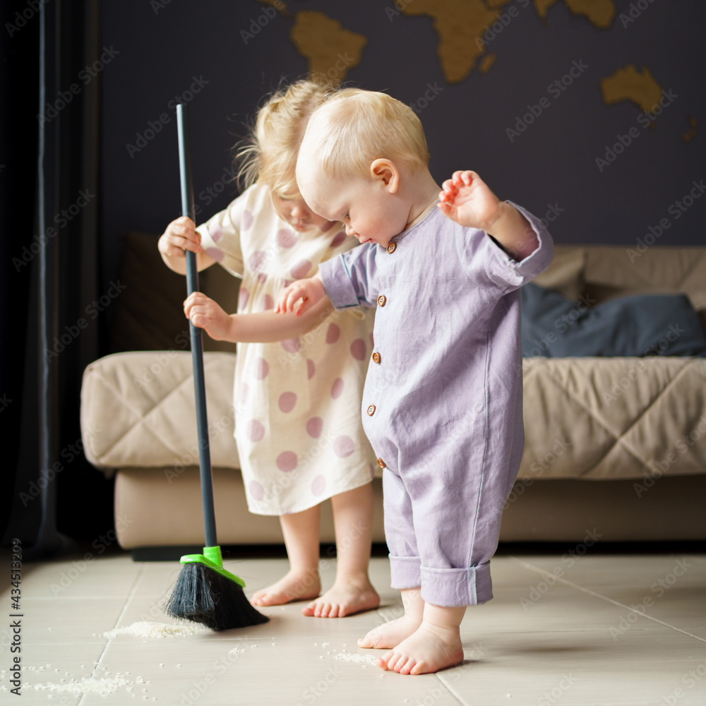 Cute little children infant boy and toddler girl in linen clothes ...