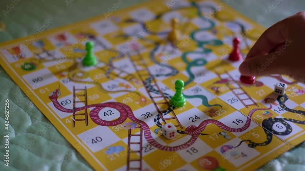 Close-up of snakes and ladders game children playground. Stock Video ...