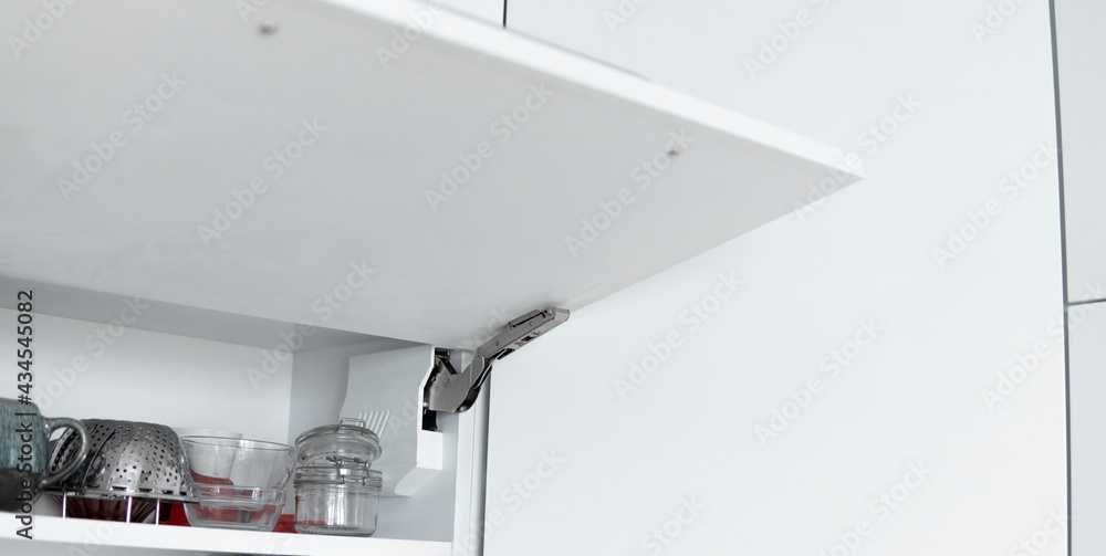 Kitchen cabinet with open fronts. Lift system for bifold fronts for ...