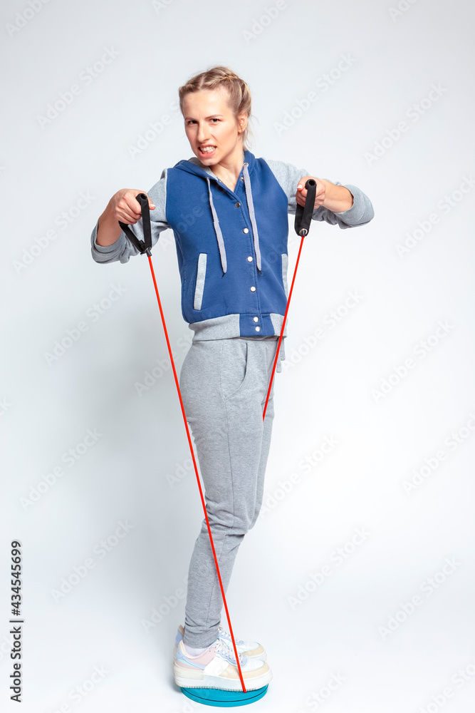 Agressive Caucasian Female Athlete Posing on Body Spinner Using ...