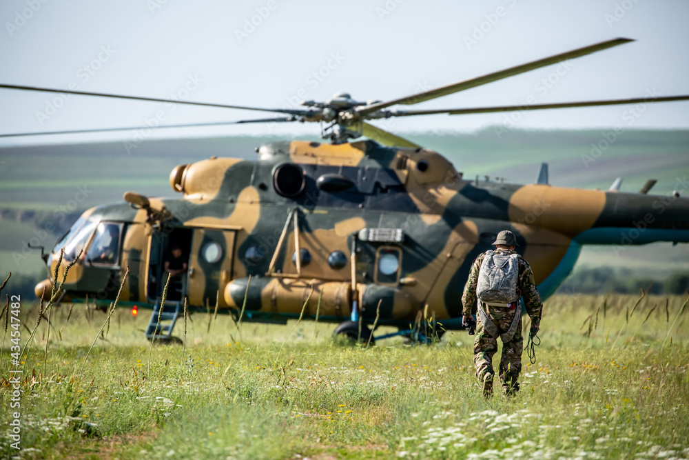 Military helicopter with soldiers. Armed conflict between Israel and ...