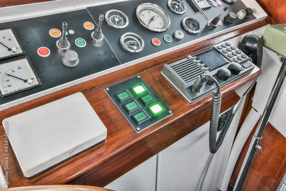 From above radio equipment and control buttons on dashboard in cockpit ...