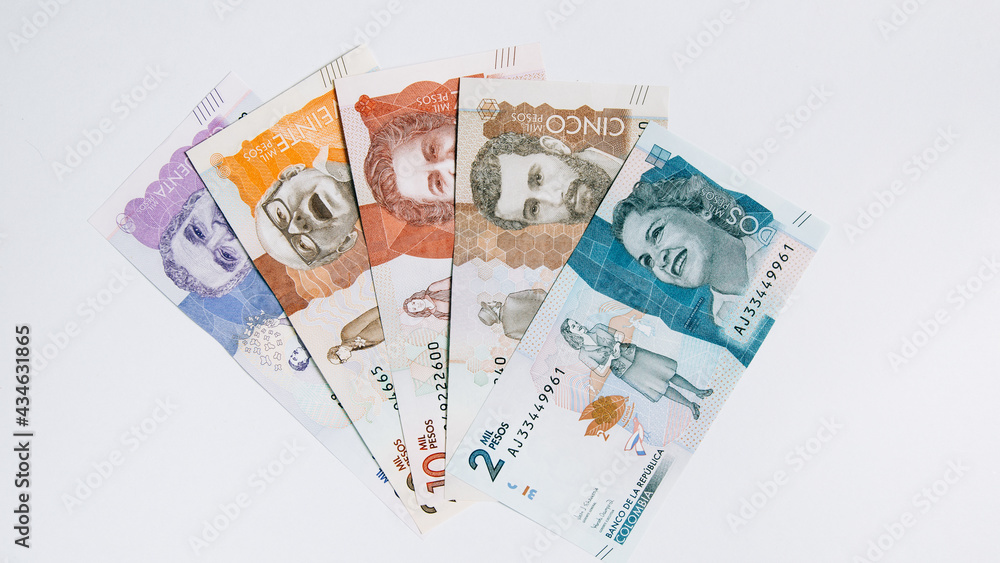 Colombian money of different denominations on white background Stock ...
