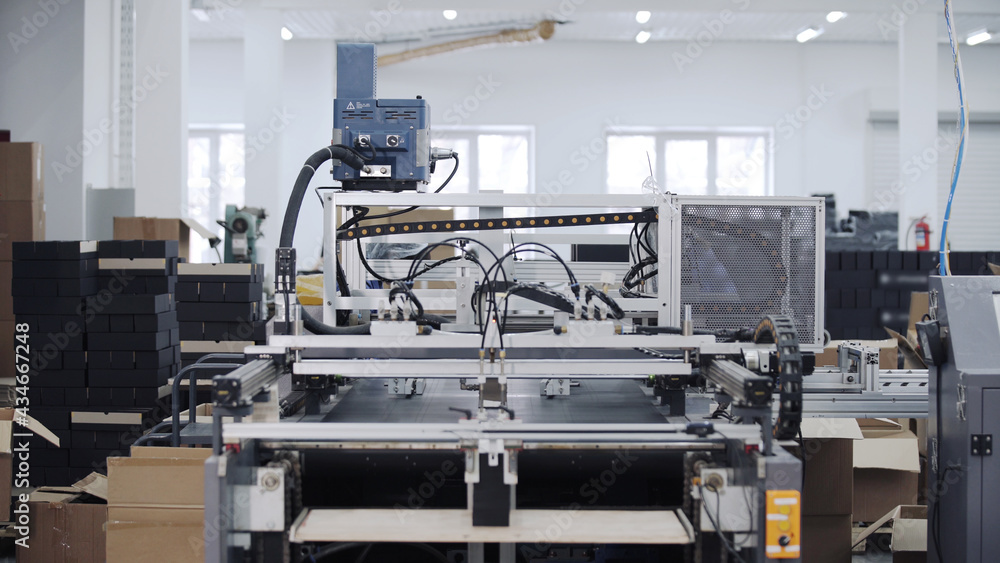 Modern automatic machine line of cardboard box. Conveyor line for the ...