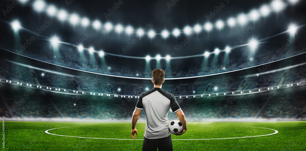 soccer player at soccer stadium. ready for game in front of the soccer ...