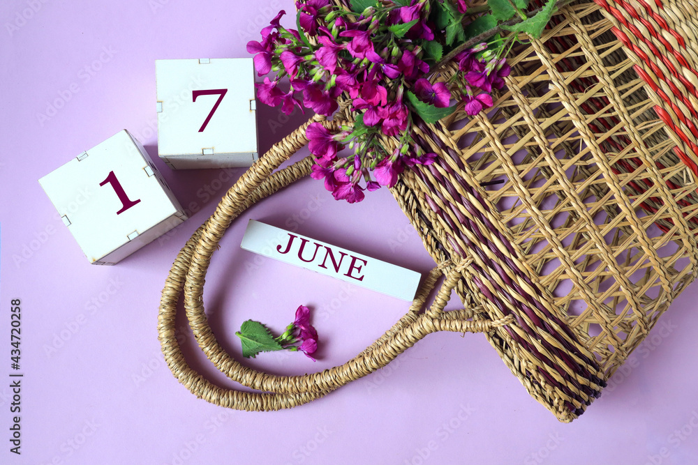 Calendar for June 17: cubes with the number 17 , the name of the month ...