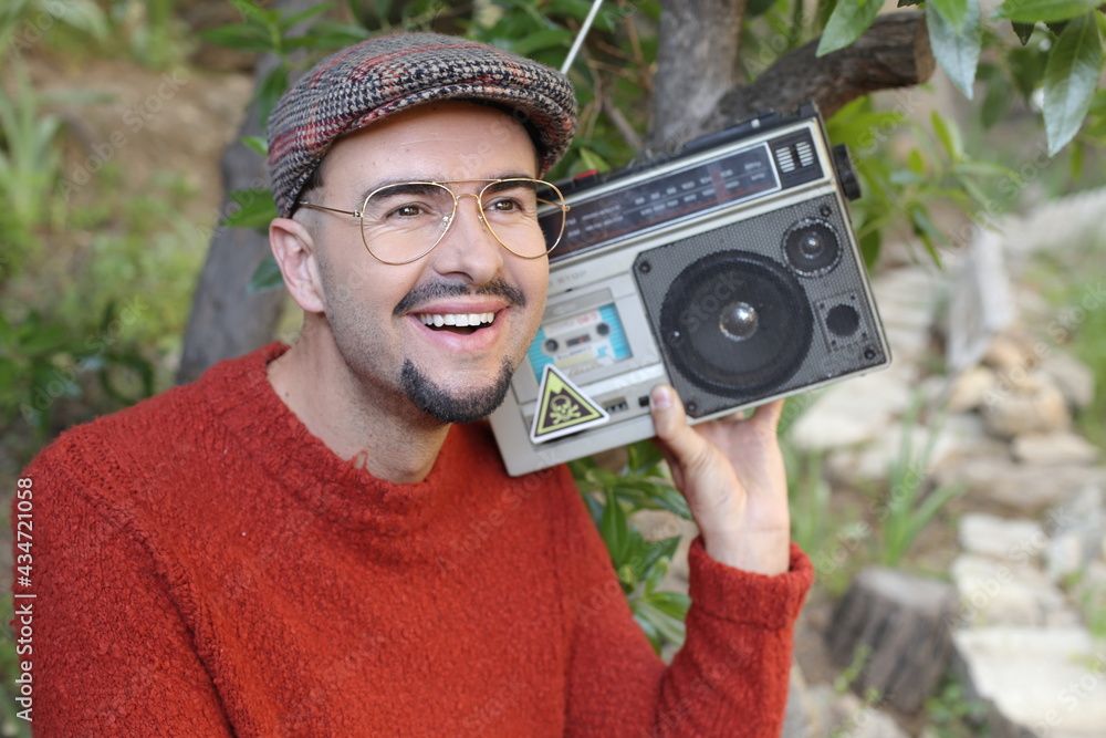 Man holding stereo boombox in the 1980s Stock Photo | Adobe Stock