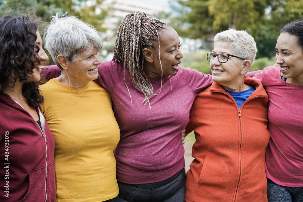 Foto de Happy multi generational women having fun together after sport ...