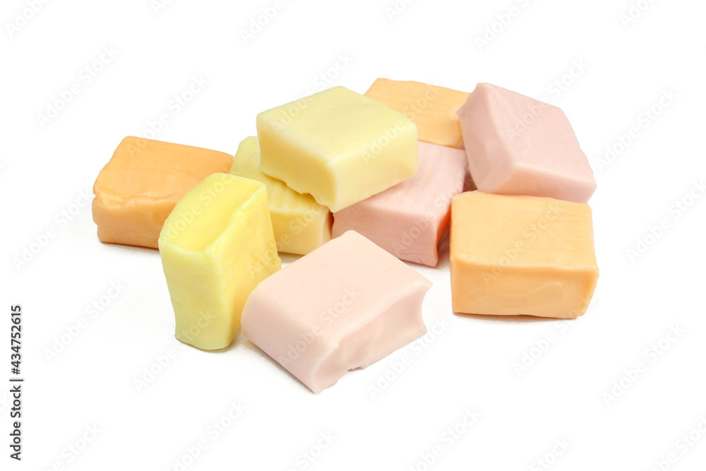 Colorful chewy candies isolated on white background. Square shaped ...