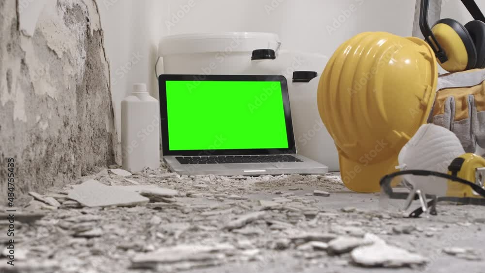 Green screen laptop computer. House renovation concept. Background wall ...