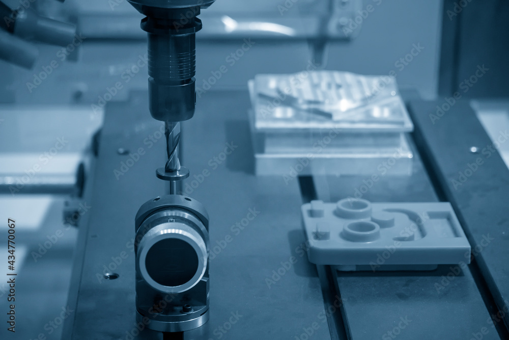 The tool length measurement process on CNC milling machine. The tool ...
