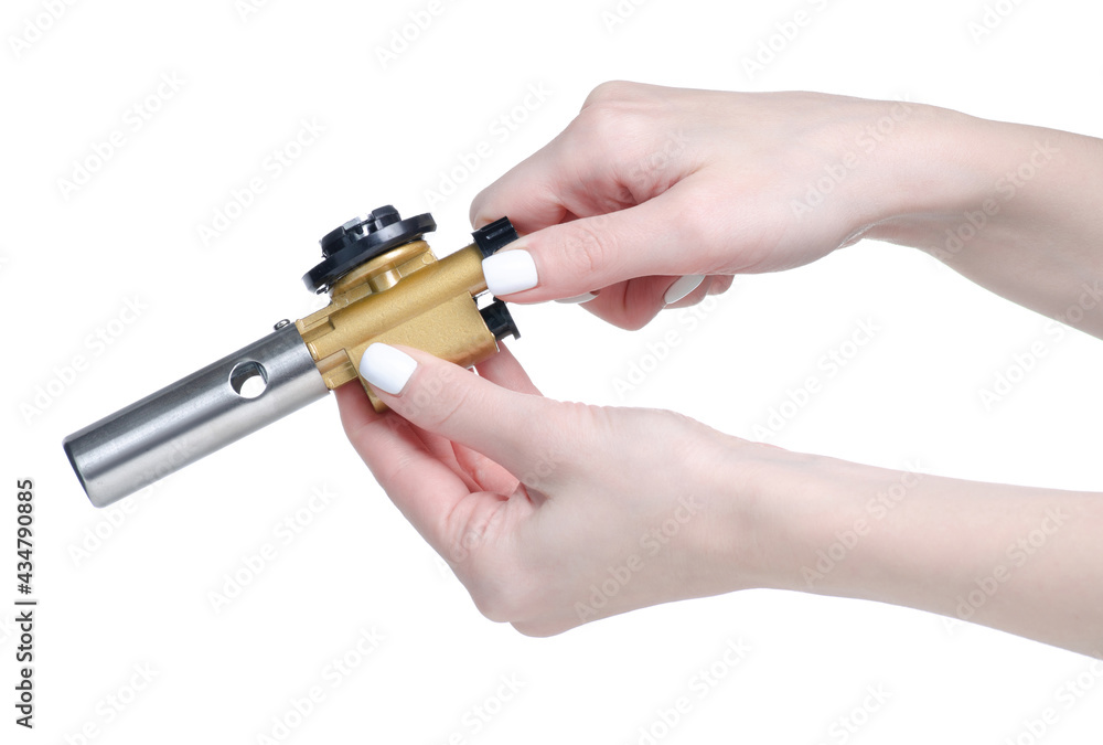 Manual gas-burner tool in hand on white background isolation Stock ...