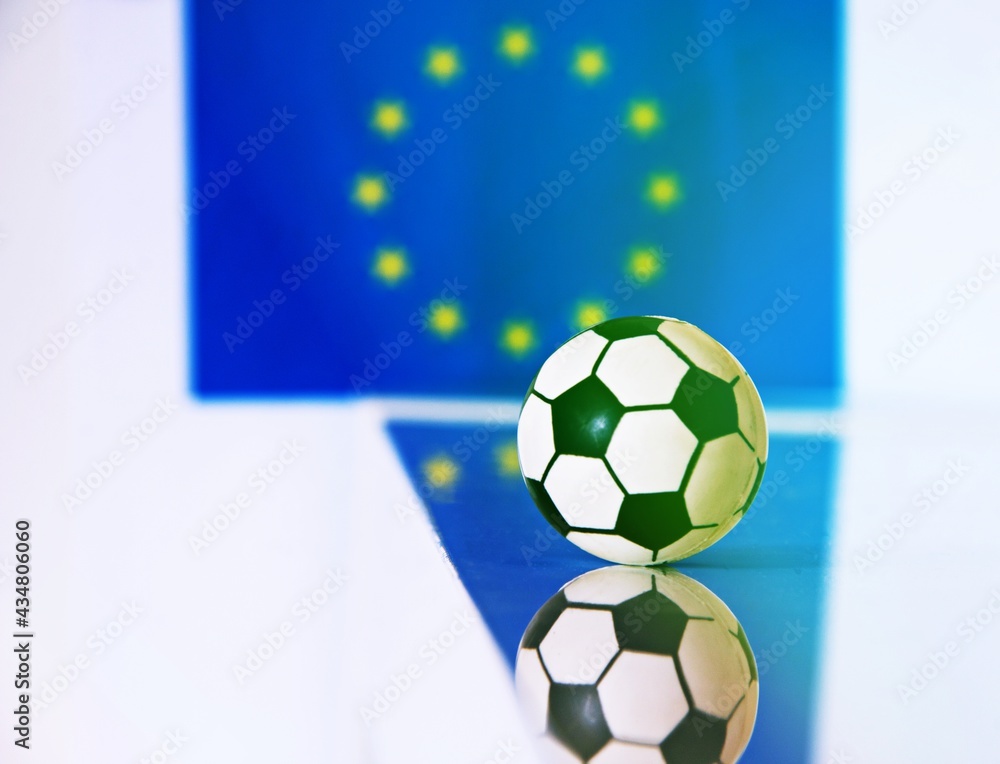Soccer ball with the European flag as background concept of Euro 2020 ...