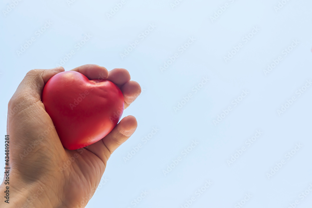 Red heart in woman hands, heart health and peace concept.World heart ...