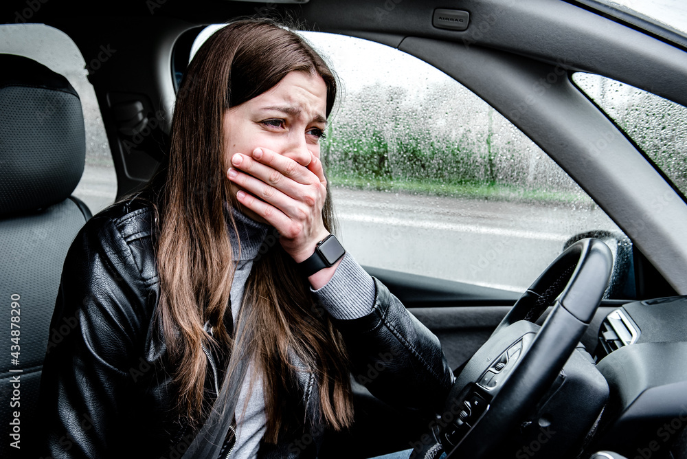 Sad woman driver feeling depressed and crying in the car. Stock Photo ...