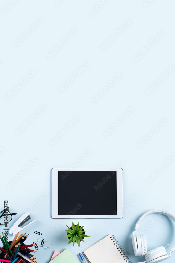 Online learning design concept. Top view of student table with tablet ...