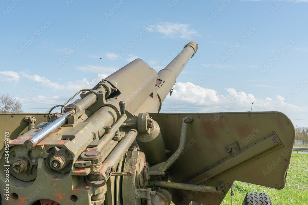 A large green cannon from the Second World War at the open-air memorial ...