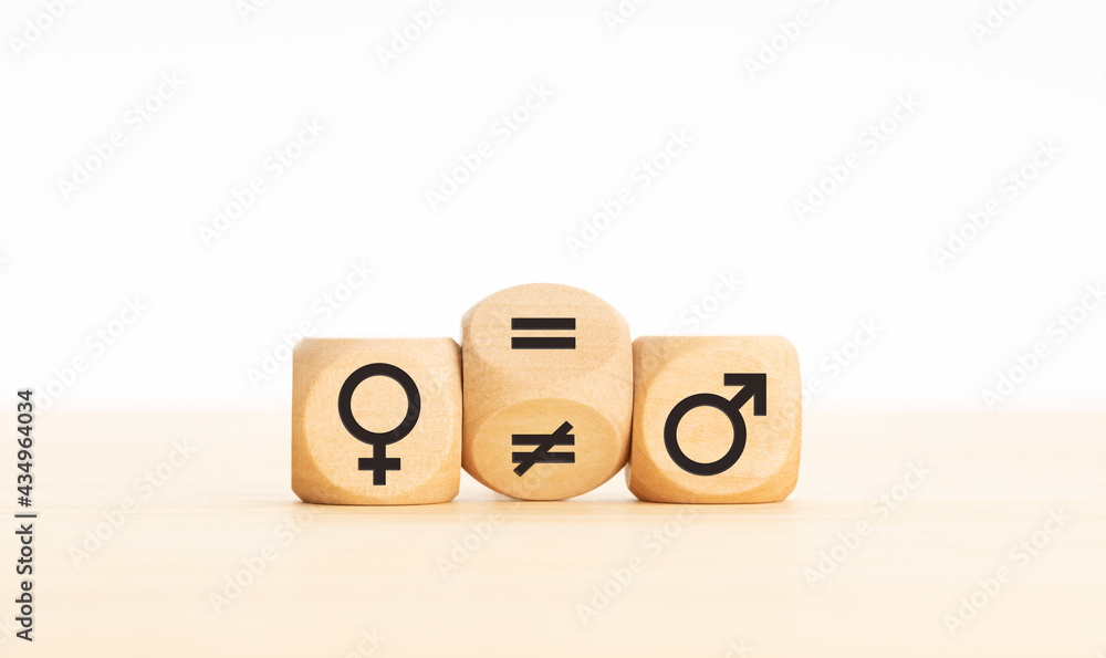 Gender equality concept. Wooden block turning a unequal sign to a equal ...
