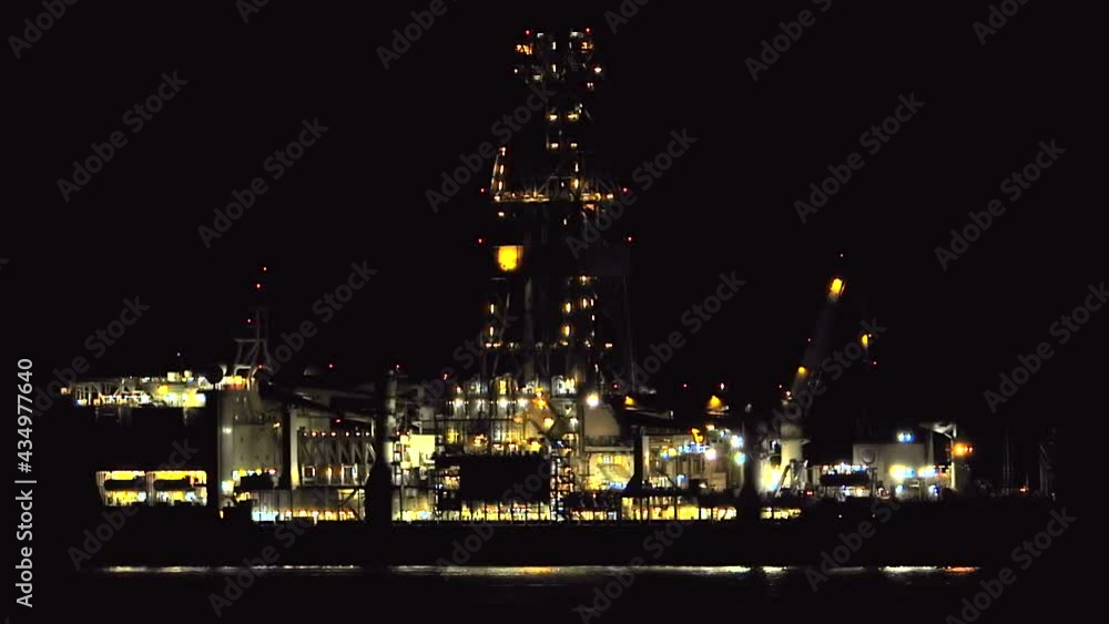 Offshore oil platform with night lights.Drilling rig petroleum natural ...