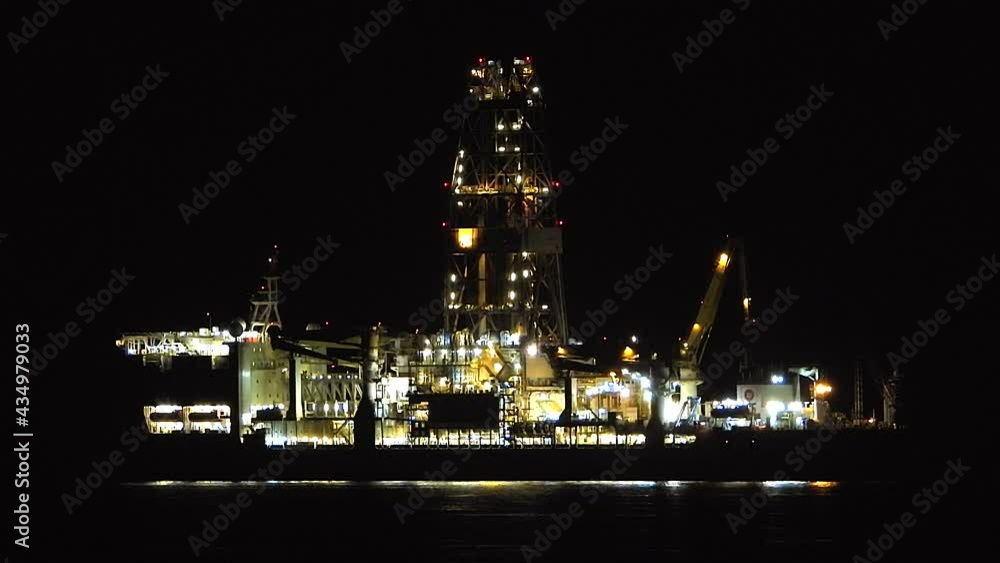 Offshore oil platform with night lights.Drilling rig petroleum natural ...