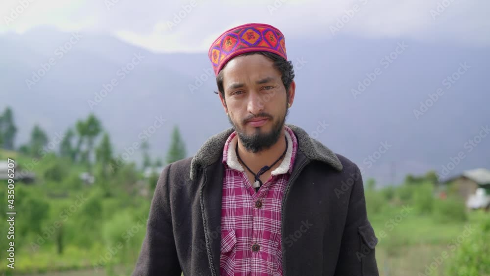 A young Indian male Himachali man (Pahari male) wearing a traditional ...