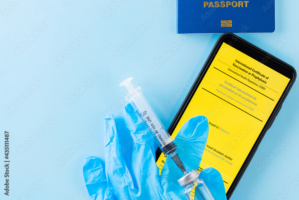 Vaccination concept. Yellow international certificate of vaccination ...