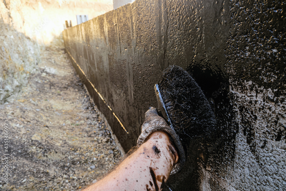 Protective waterproofing coating of walls in contact with the ground ...