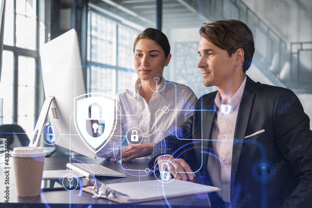 Businessman and businesswoman working together to protect clients ...