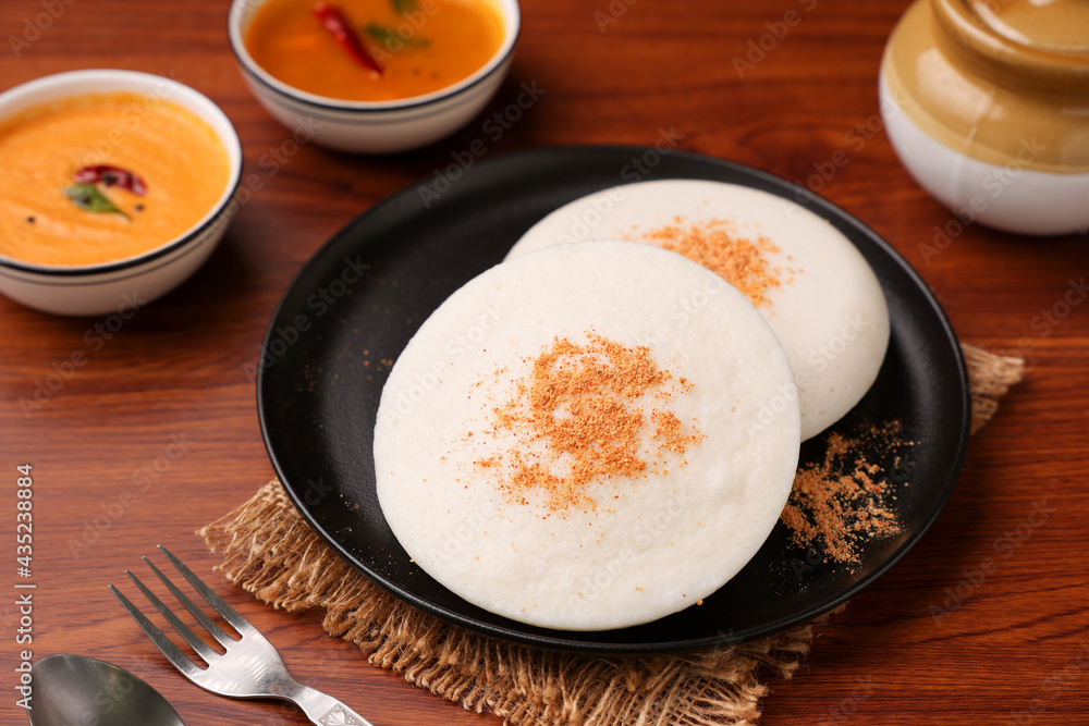 Thatte idli or Plate idly with sambar coconut chutney, chutney podi ...