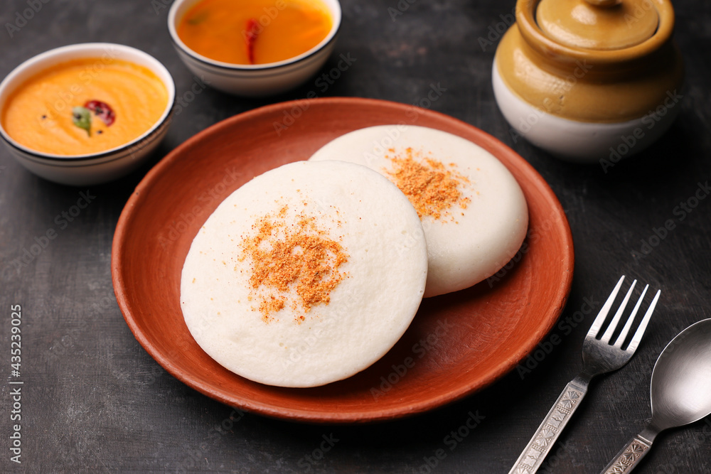 Thatte idli or Plate idly with sambar coconut chutney, chutney podi ...