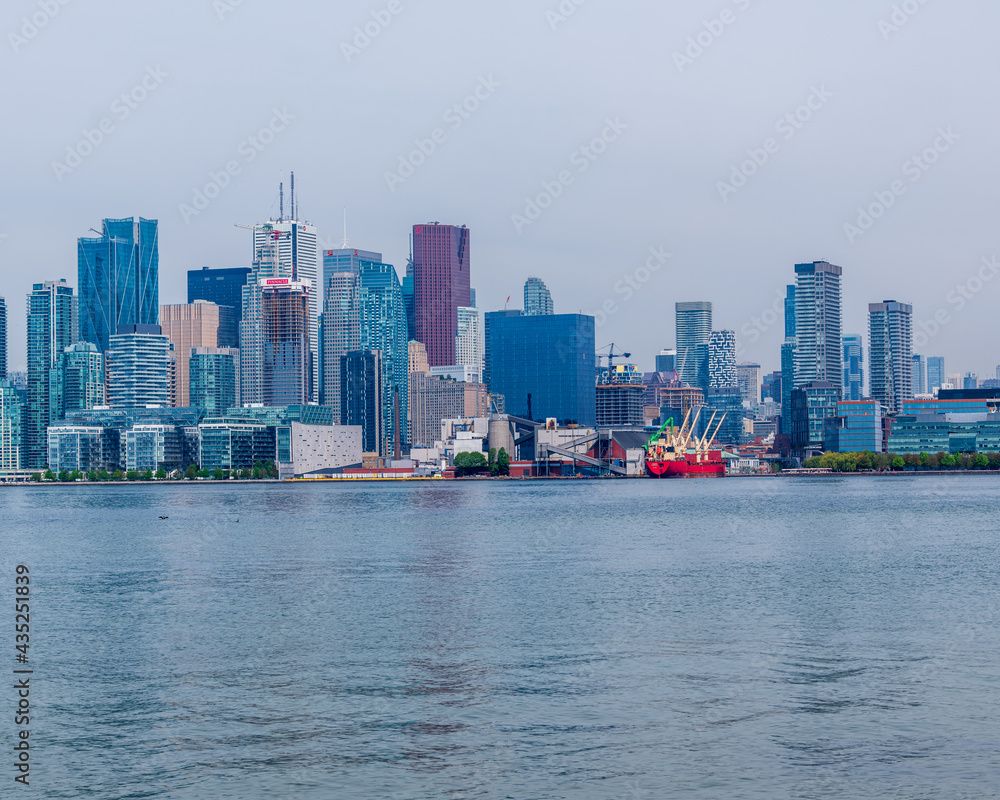 Toronto's Harbourfront and skyline seen from the beach on Ward's Island ...