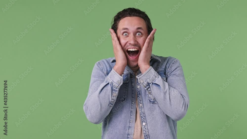 Side profile view surprised amazed shocked handsome young man 20s years ...