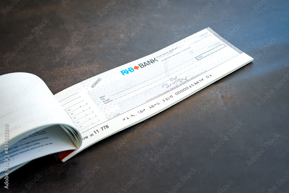 Kuala Lumpur, Malaysia - May, 2021 Empty cheque book from RHB bank ...