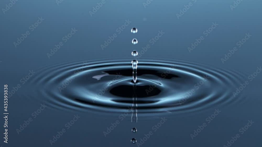 Super slow motion of dripping water drop filmed with macro lens. Filmed ...