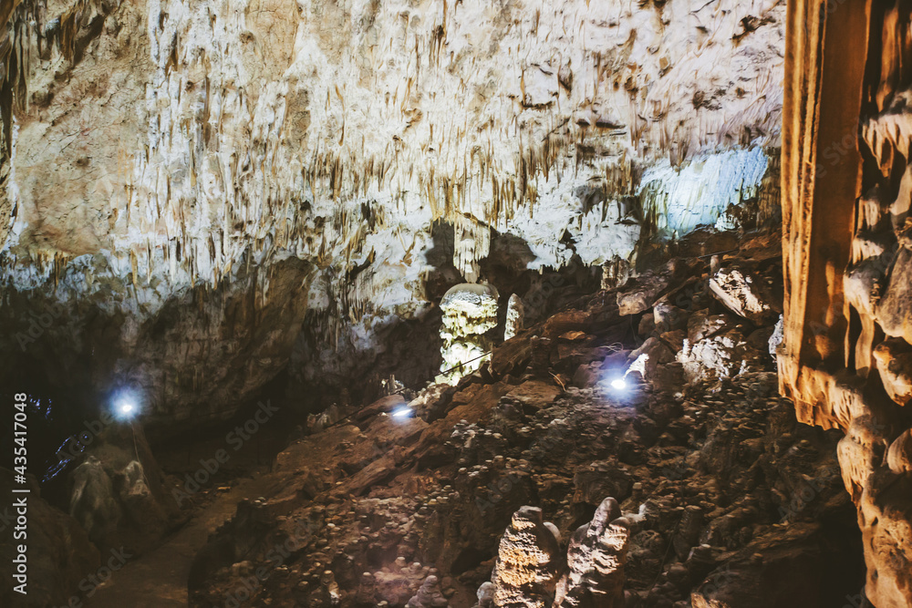 Underground cave, amazing scene , view of stalactites and stalagmite ...