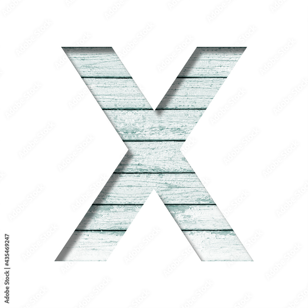 Font on old boards. The letter X cut out of paper on a rustic wall of ...