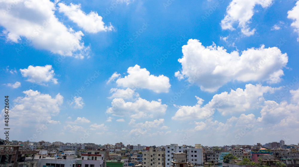 Bright Blue sky with white clouds in hot summer at Mirpur in Dhaka ...