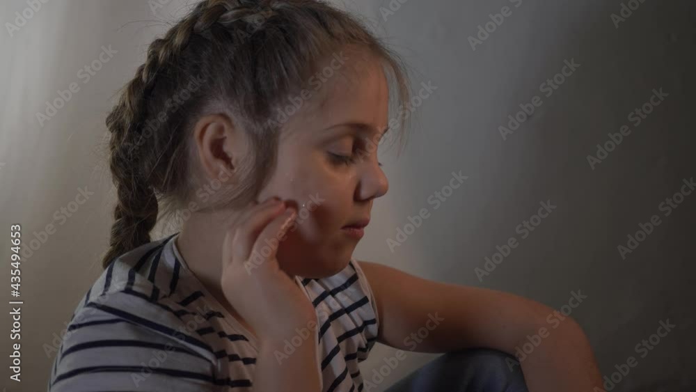 Video Stock Girl is cry in corner. Violence against children in family ...
