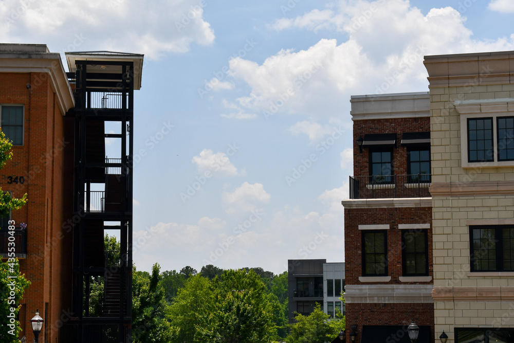 exterior fire escape of urban condominium apartment mixed use complex ...