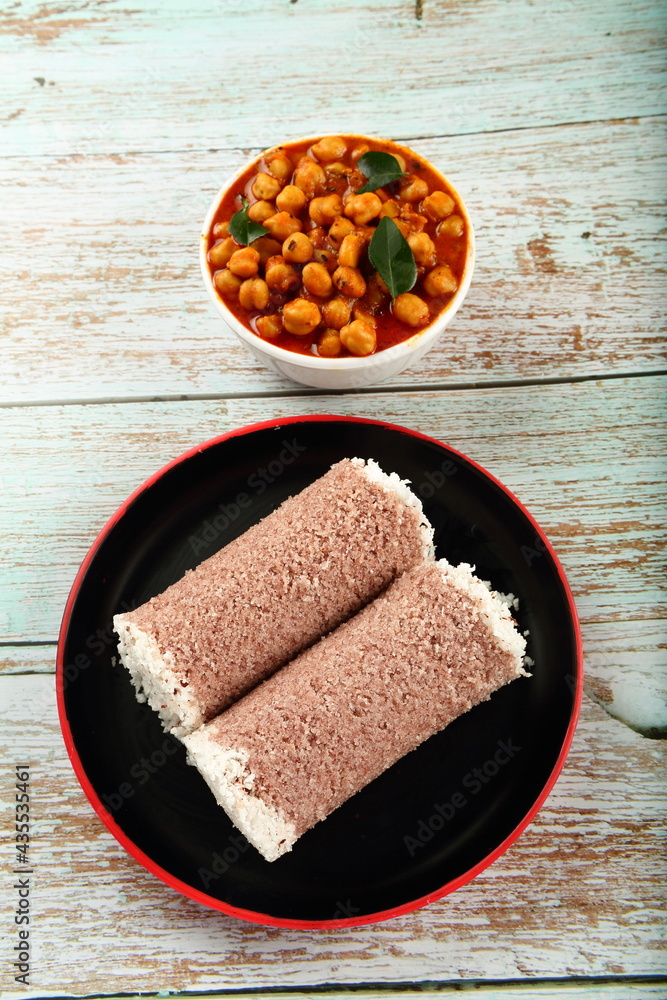 Healthy vegan diet food- steamed red rice puttu with chickpea curry ...