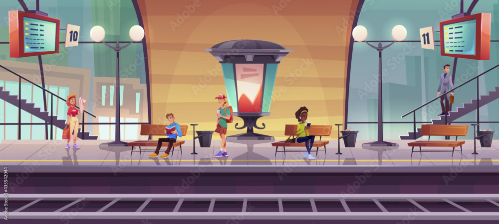 People waiting train on indoor railway station platform, passengers in ...