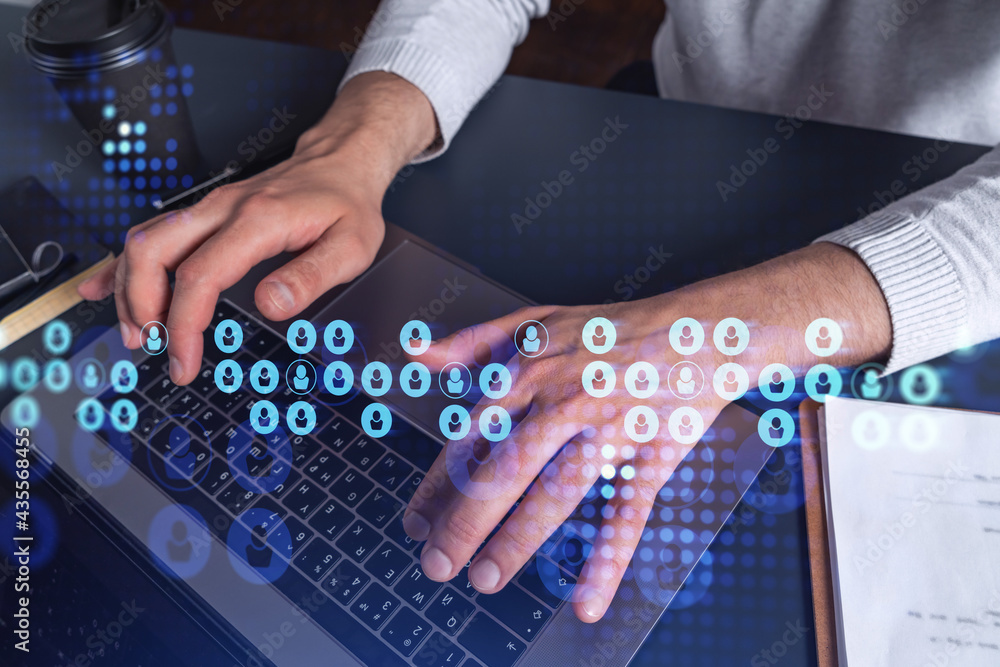 Hands of hr specialist is typing the keyboard in the internet to find ...