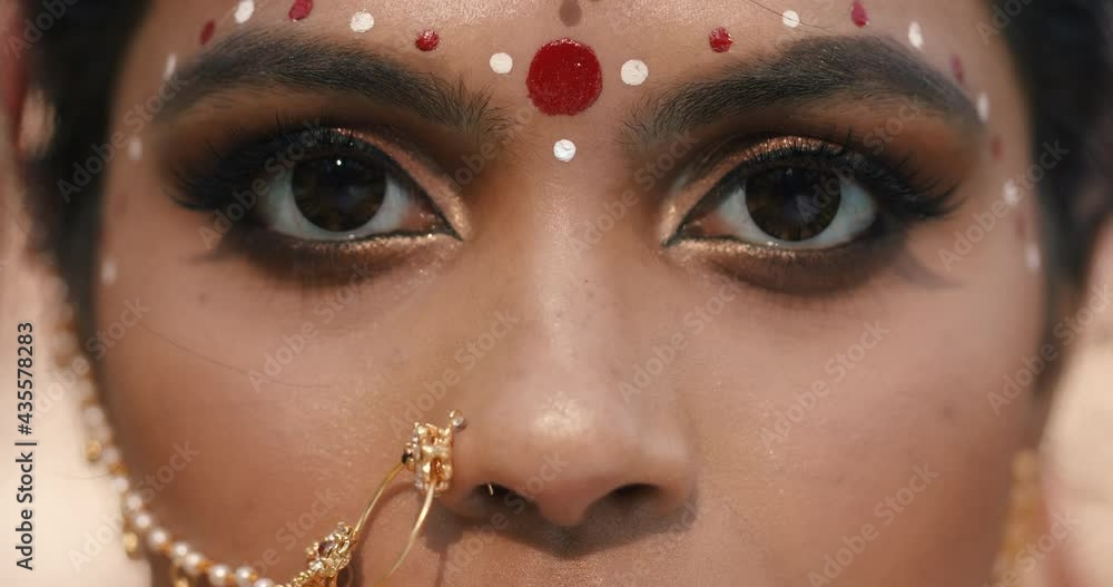 Close up of Expressive big Brown Indian Woman's eyes with Traditional ...