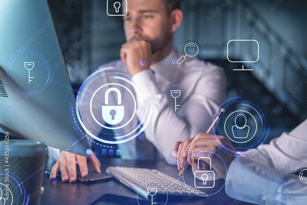 Two colleagues working together to protect clients confidential ...