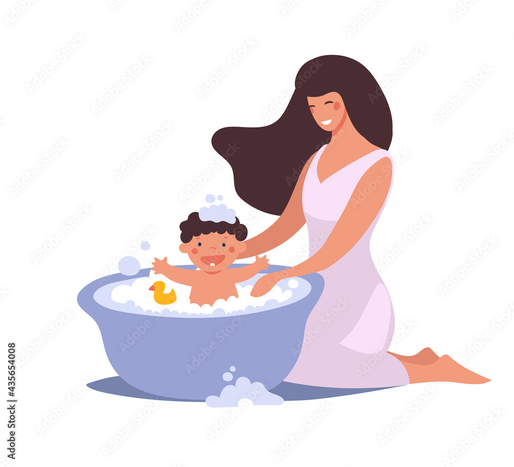 Mom washes the baby in the bathroom. The kid bathes and washes with ...